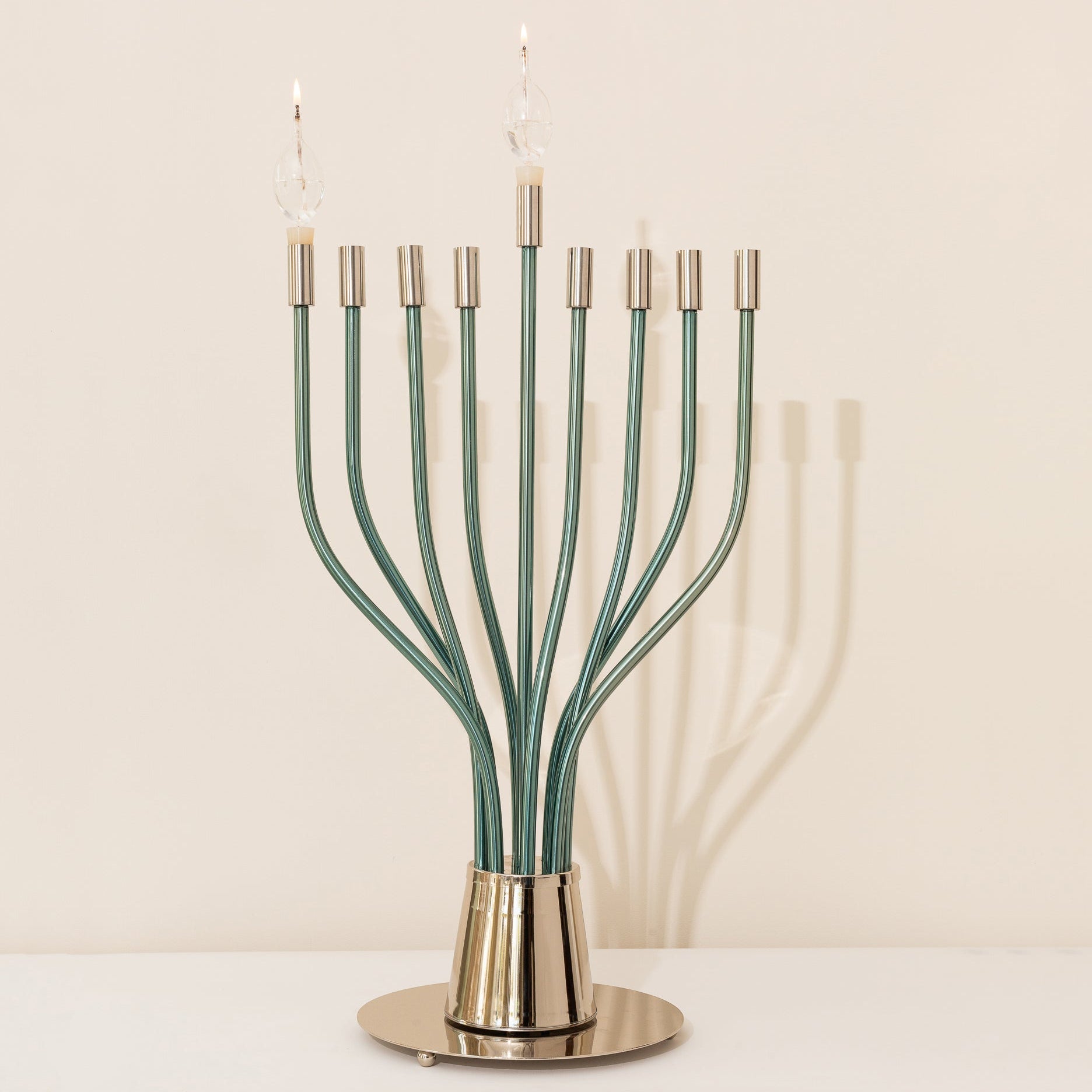 A huge Chanukah menorah with a spectacular design made of nickel and g ...